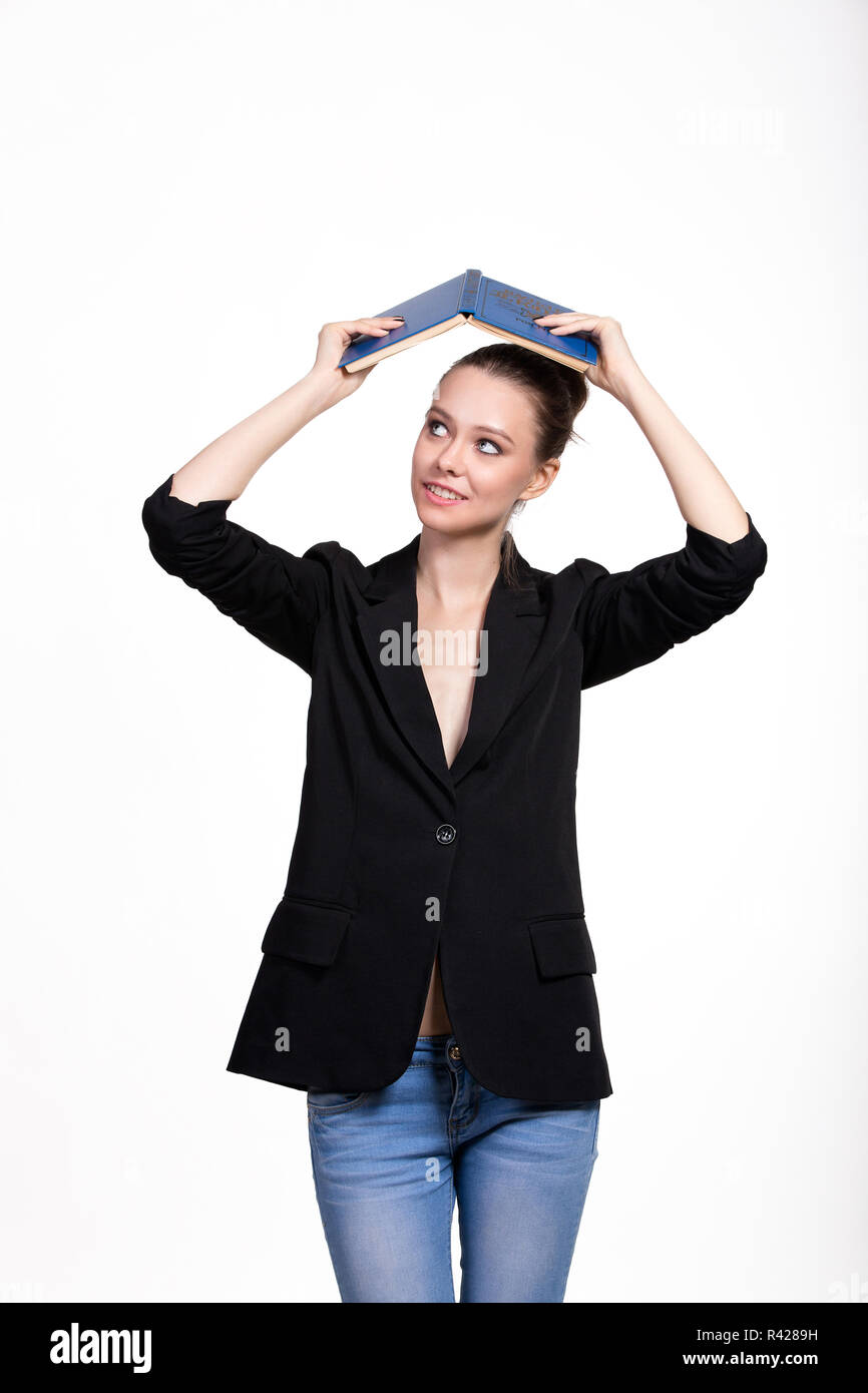 Beautiful female student with a book Stock Photo - Alamy