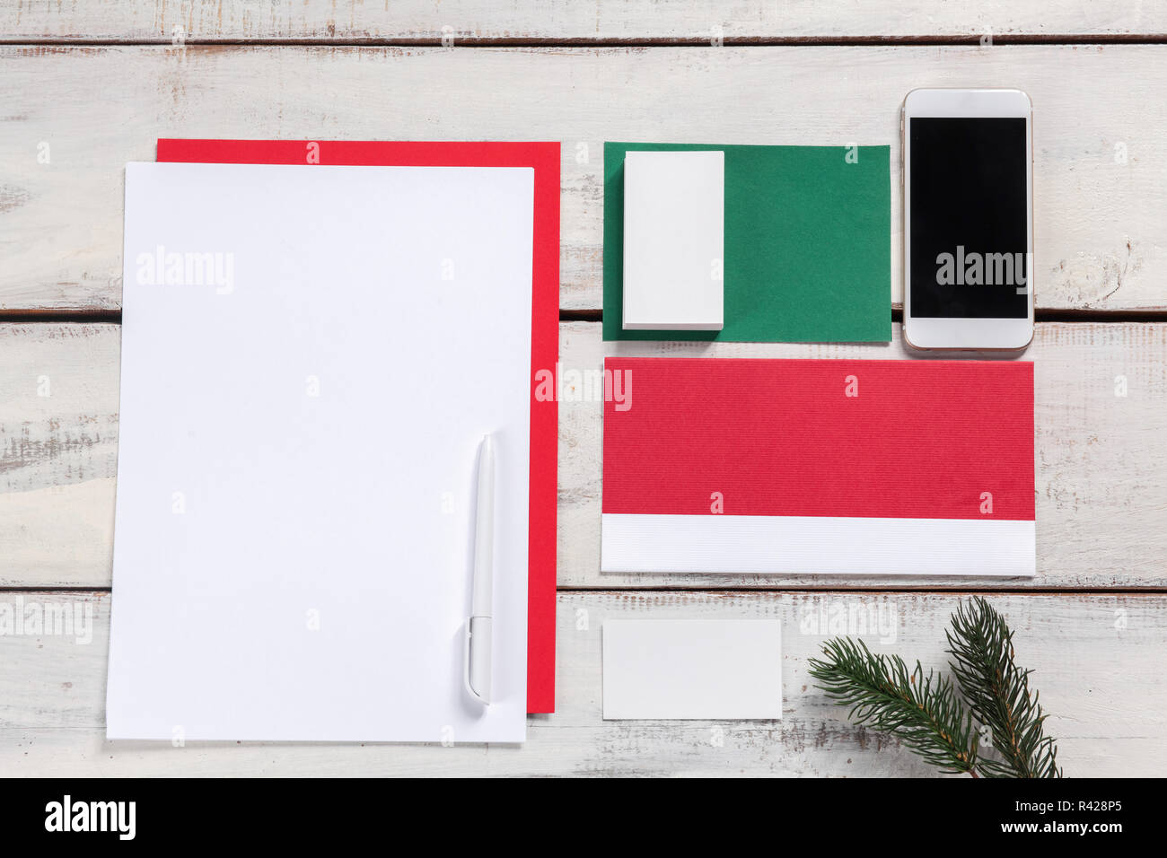 The blank sheet of paper on the wooden table with a pen Stock Photo - Alamy