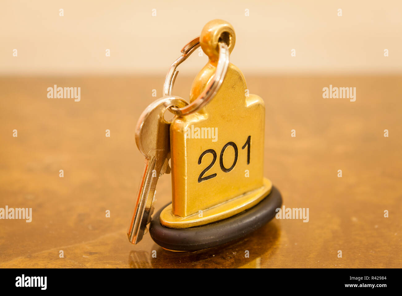 hotel room key with pendant and keyring in brass Stock Photo - Alamy