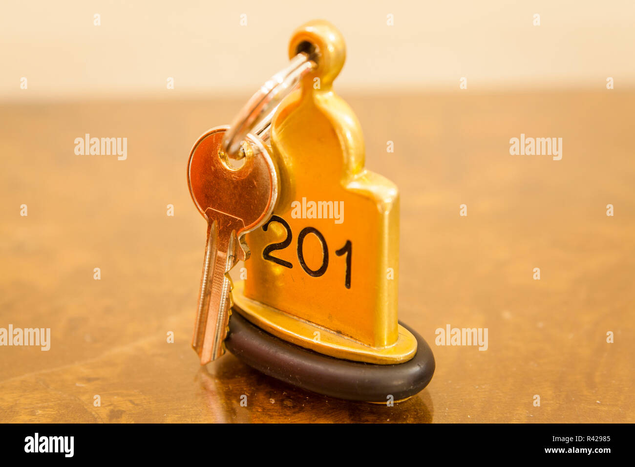 hotel room key with pendant and keyring in brass Stock Photo - Alamy
