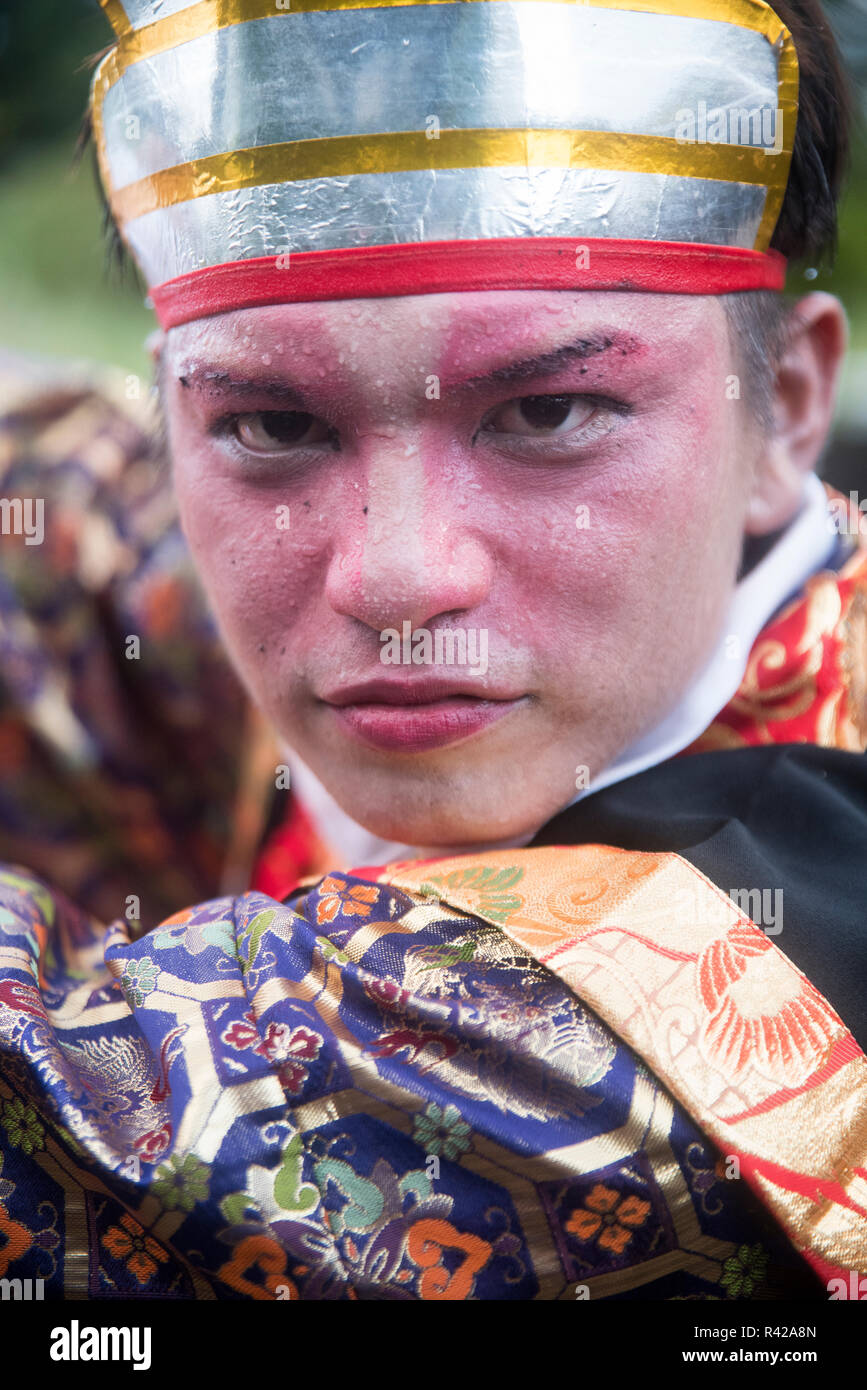 Okinawan man dressed as a Ryukyu king during the Sesoko Island tug-of ...
