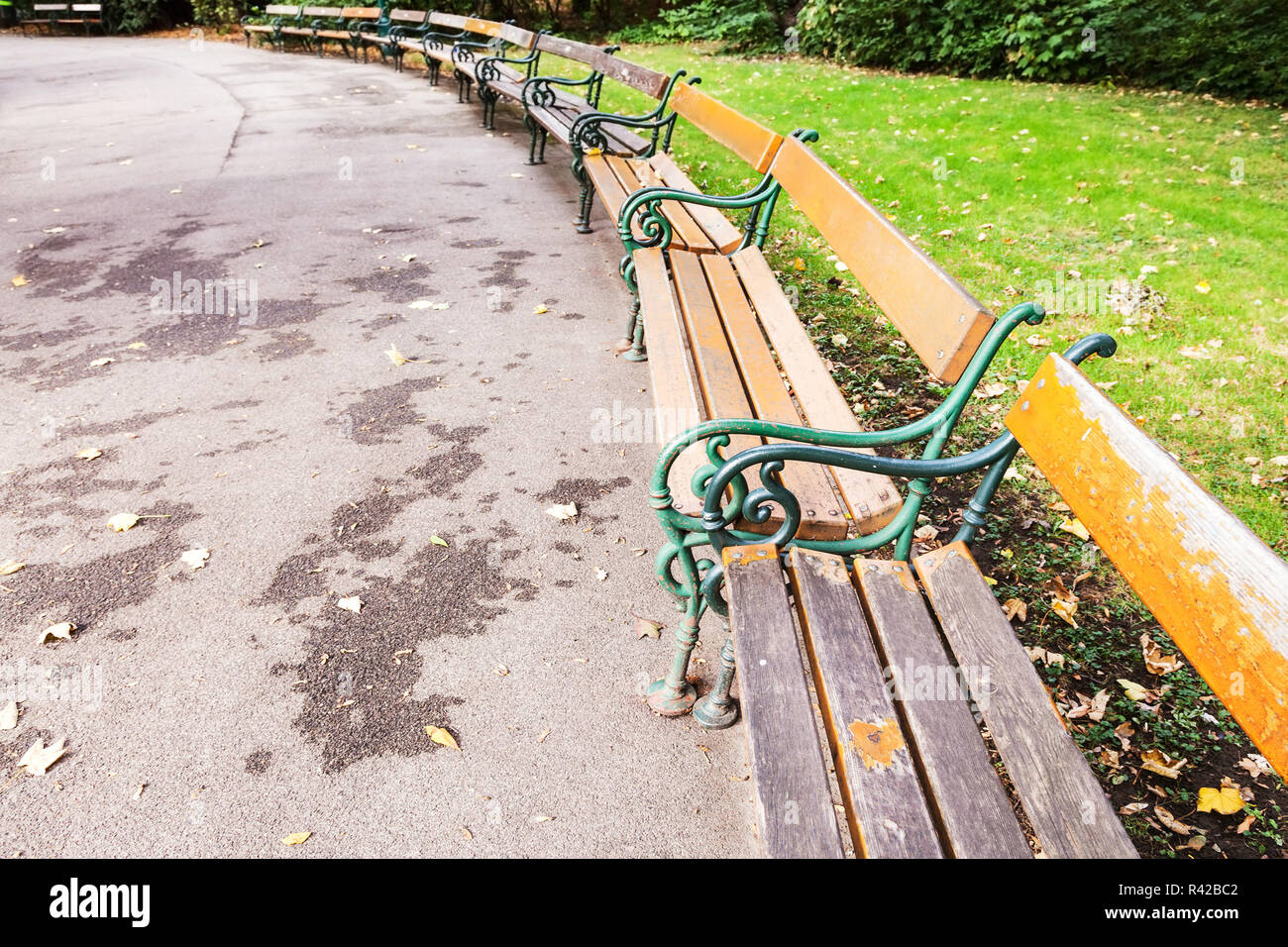 empty wooden benches in City Park Stock Photo - Alamy