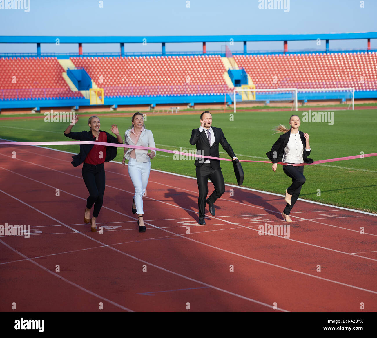 business people running on racing track Stock Photo - Alamy