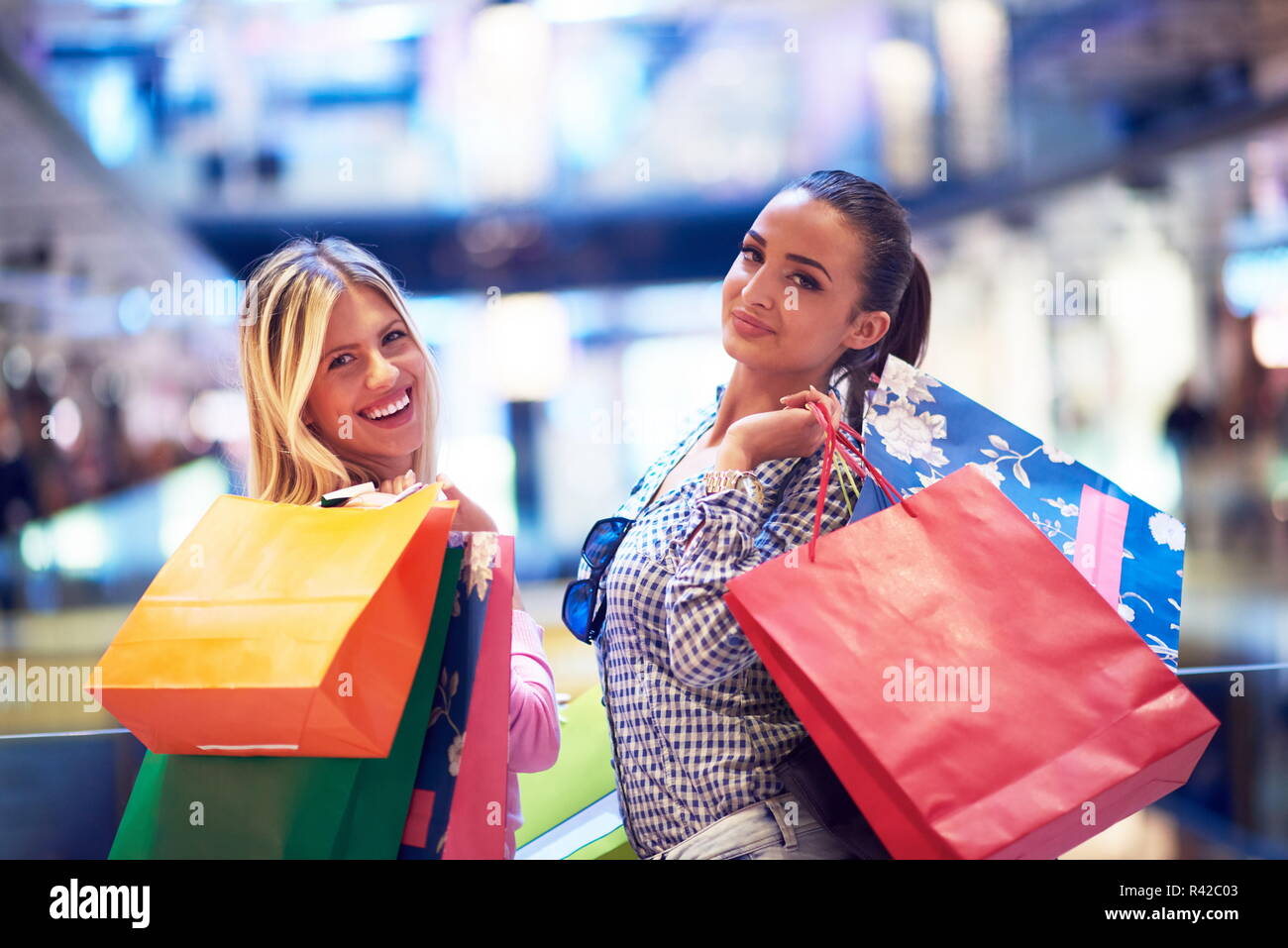 Fashion girl woman shopping in town center hi-res stock photography and ...