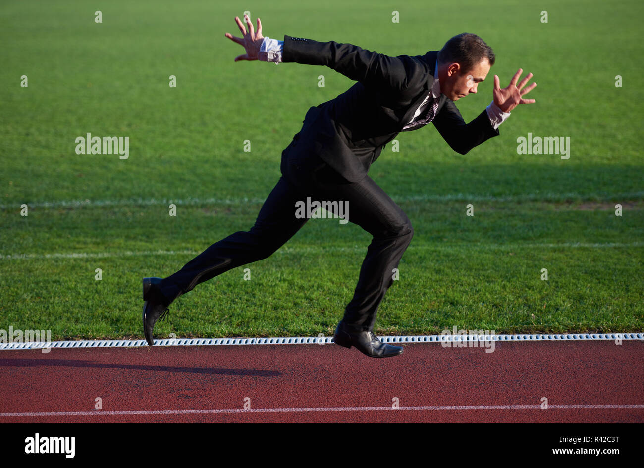 business man ready to sprint Stock Photo - Alamy