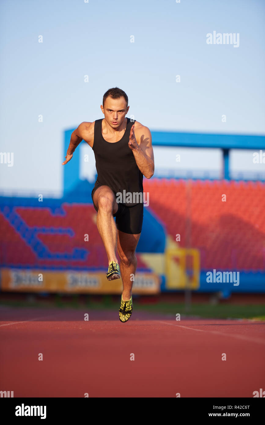 Athletic man start Stock Photo - Alamy