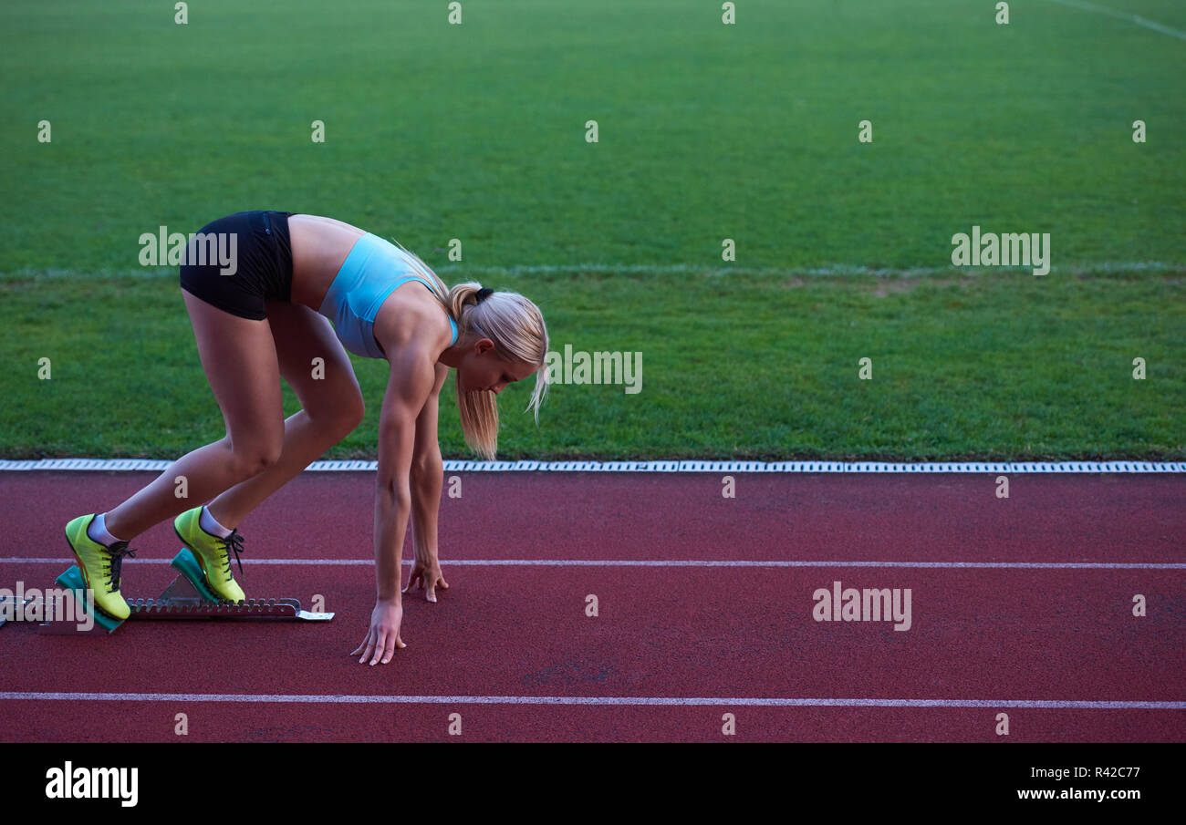 pixelated design of woman sprinter leaving starting blocks Stock Photo ...