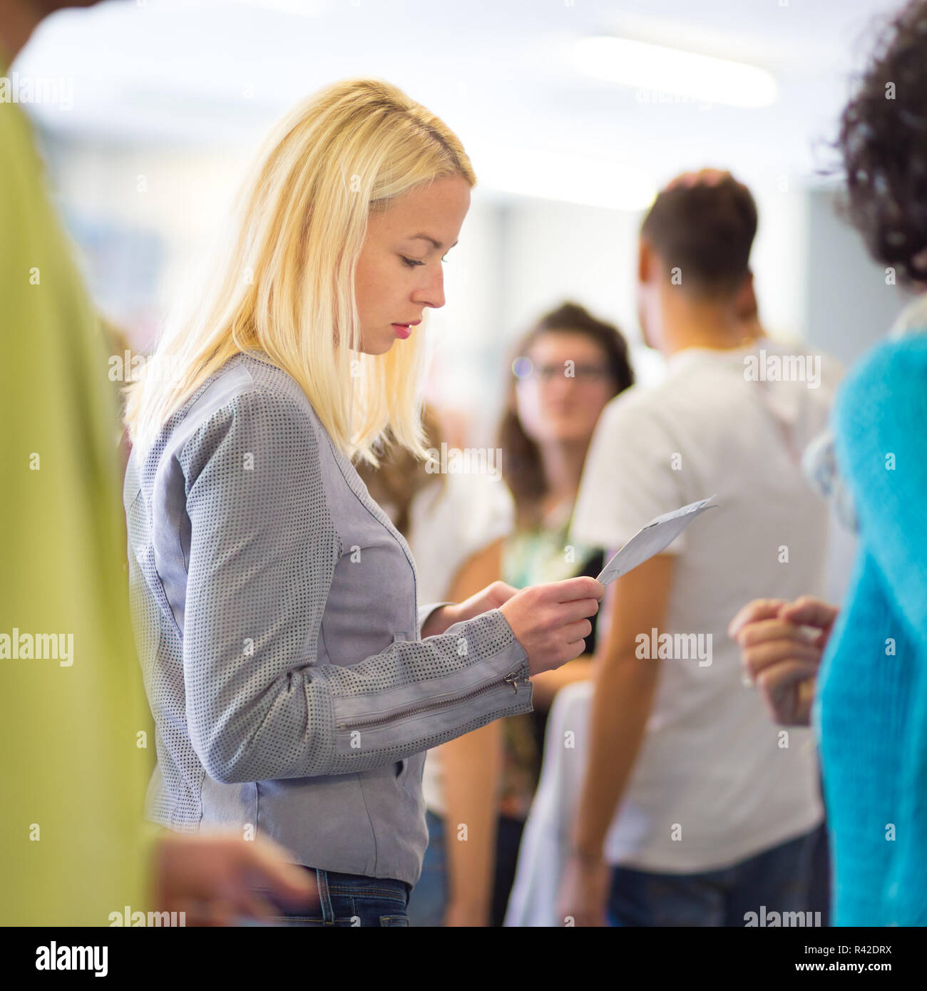 Crowd waiting in line passengers terminal hi-res stock photography and ...