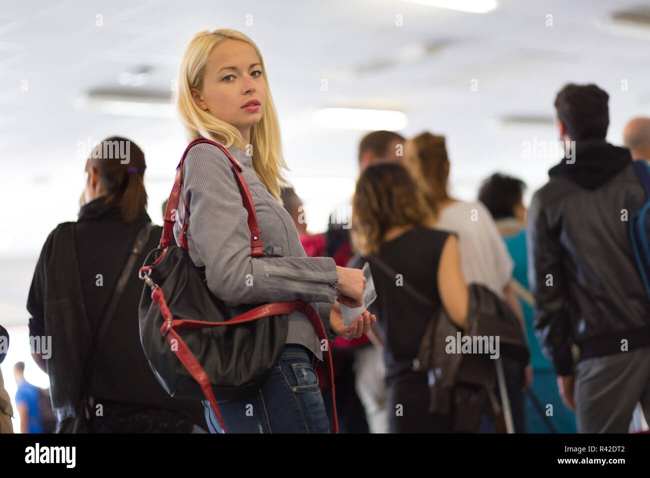 Standing holding crowd authority transportation hi-res stock ...