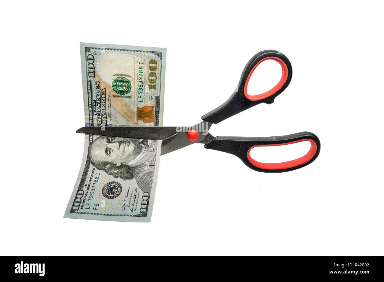 Dollars scissors money cutting hi-res stock photography and images - Alamy