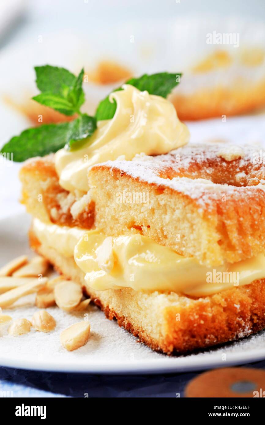 Apricot sponge cake with pudding cream Stock Photo - Alamy