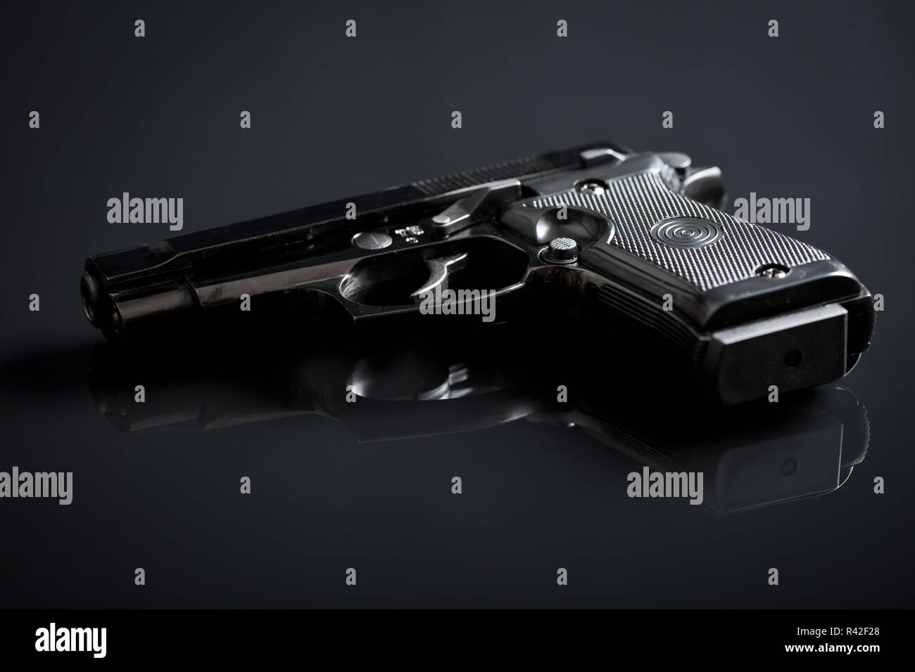handgun on black background Stock Photo - Alamy