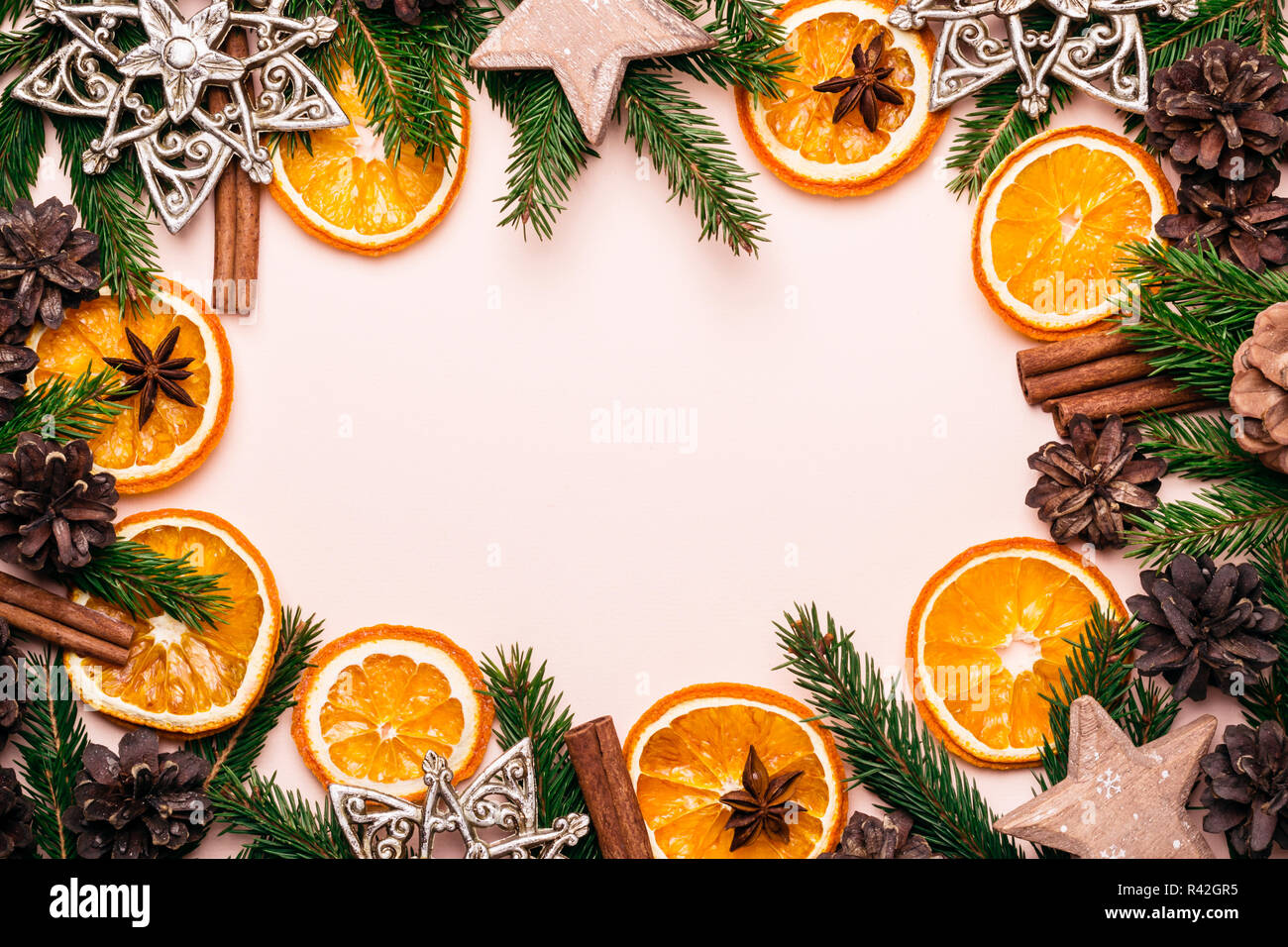Christmas natural frame of Dry Oranges Slices, fir cones and branches ...