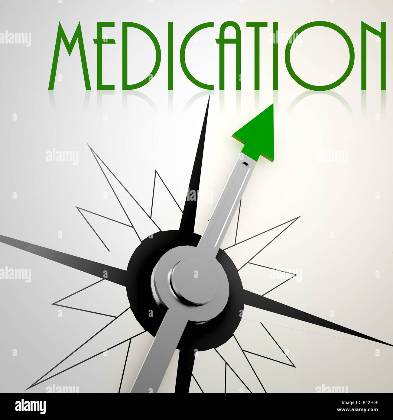 Medication on green compass Stock Photo - Alamy