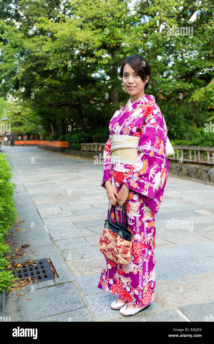 Young woman with traditional japanese clothes in Kyoto Stock Photo - Alamy