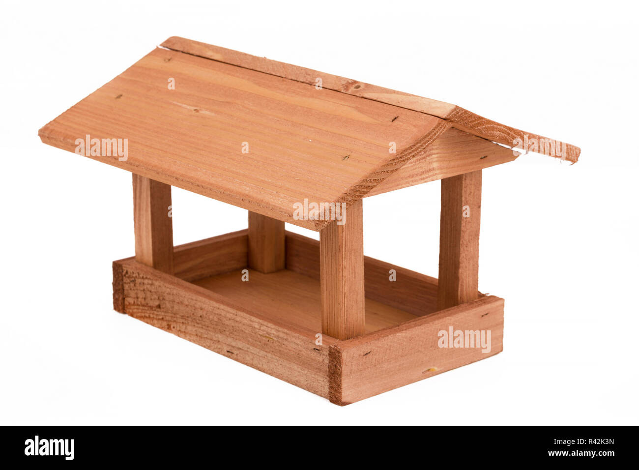 simple bird feeder isolated on white Stock Photo - Alamy