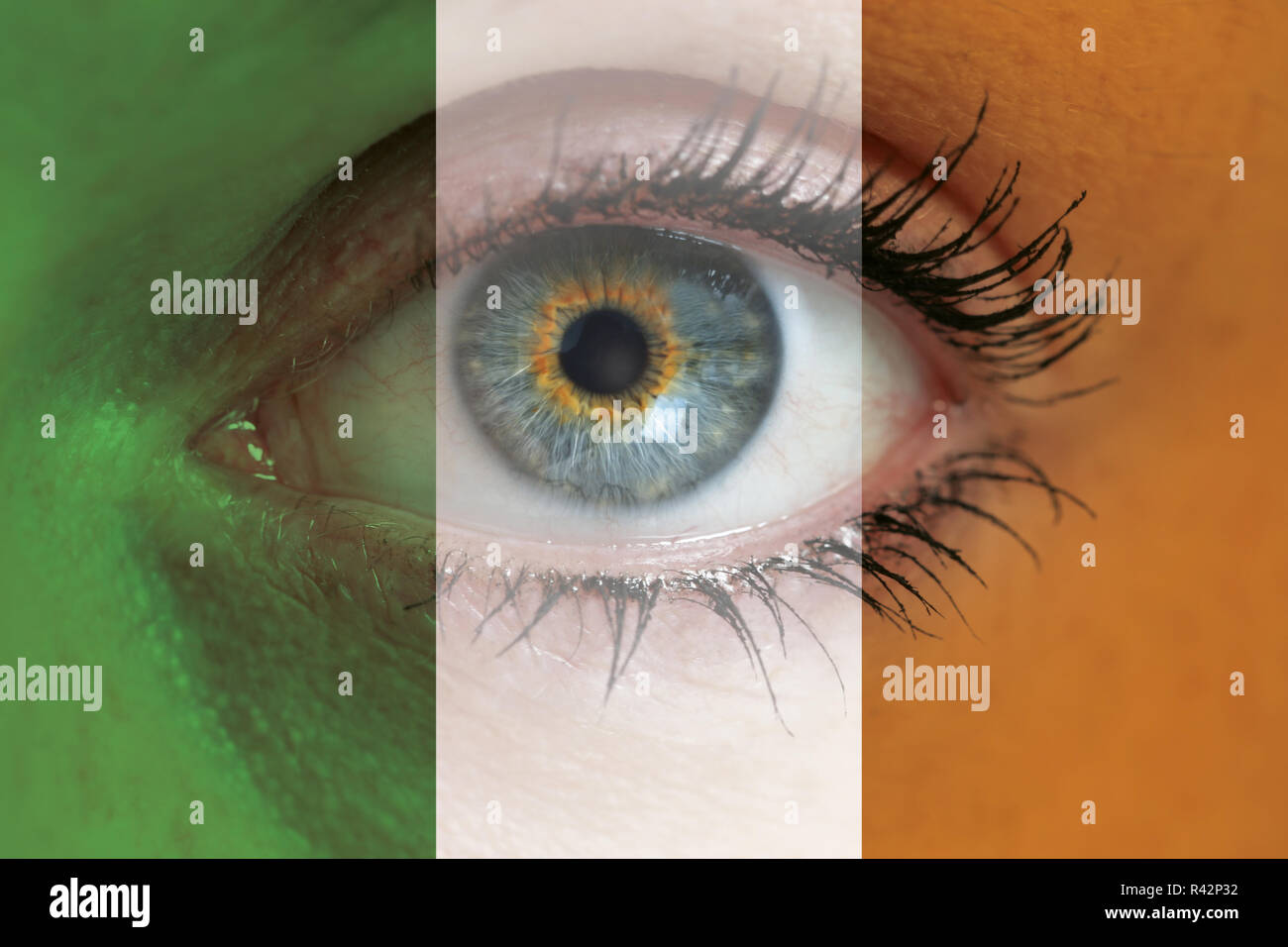eye looks through ireland flag background concept macro Stock Photo - Alamy