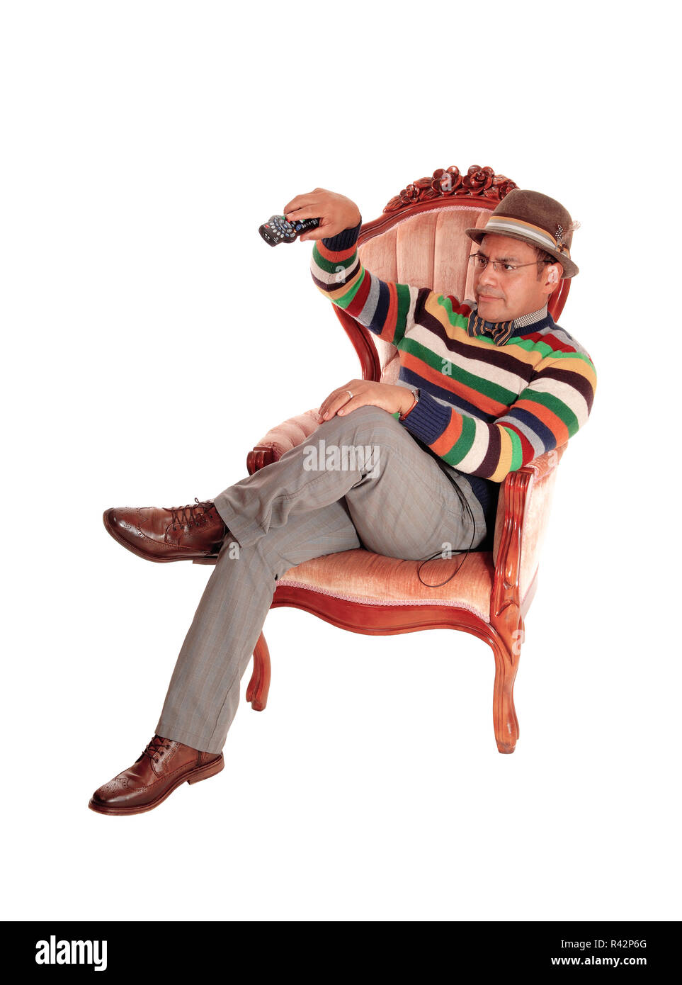 Middle age man playing with remote control Stock Photo - Alamy