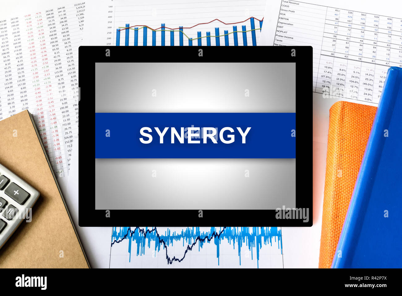 synergy word on tablet Stock Photo - Alamy