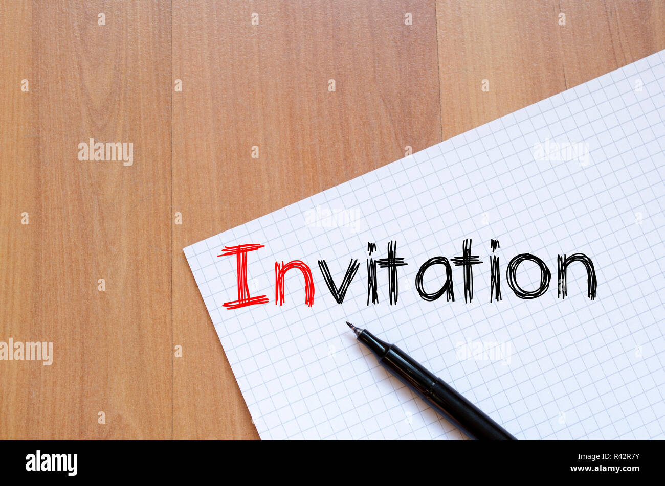 Invitation write on notebook Stock Photo - Alamy