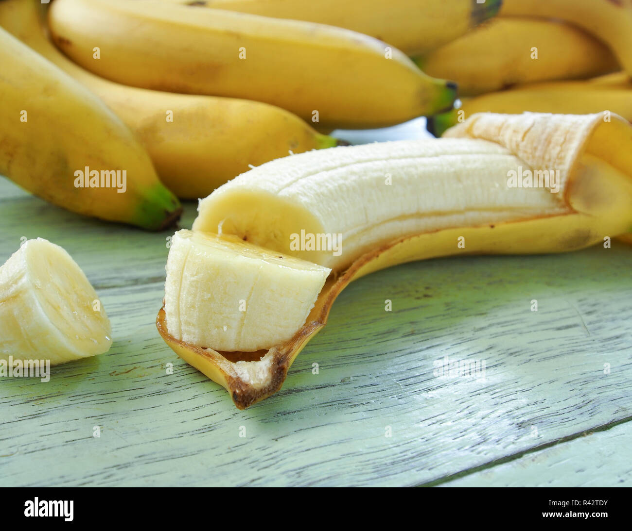 split bananas placed on a banana peel Stock Photo - Alamy