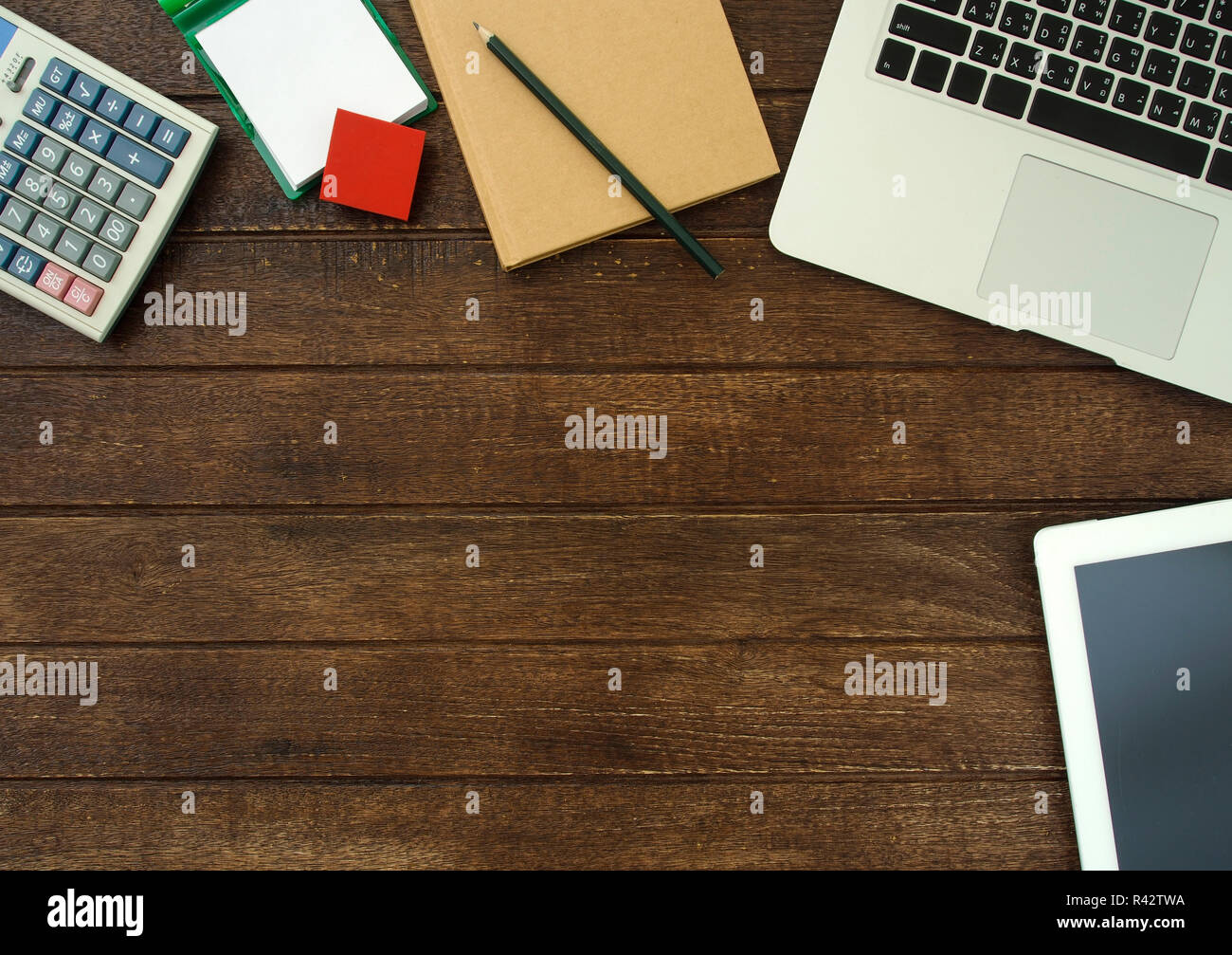 work table with notepad computer and notebook. View from above Stock ...