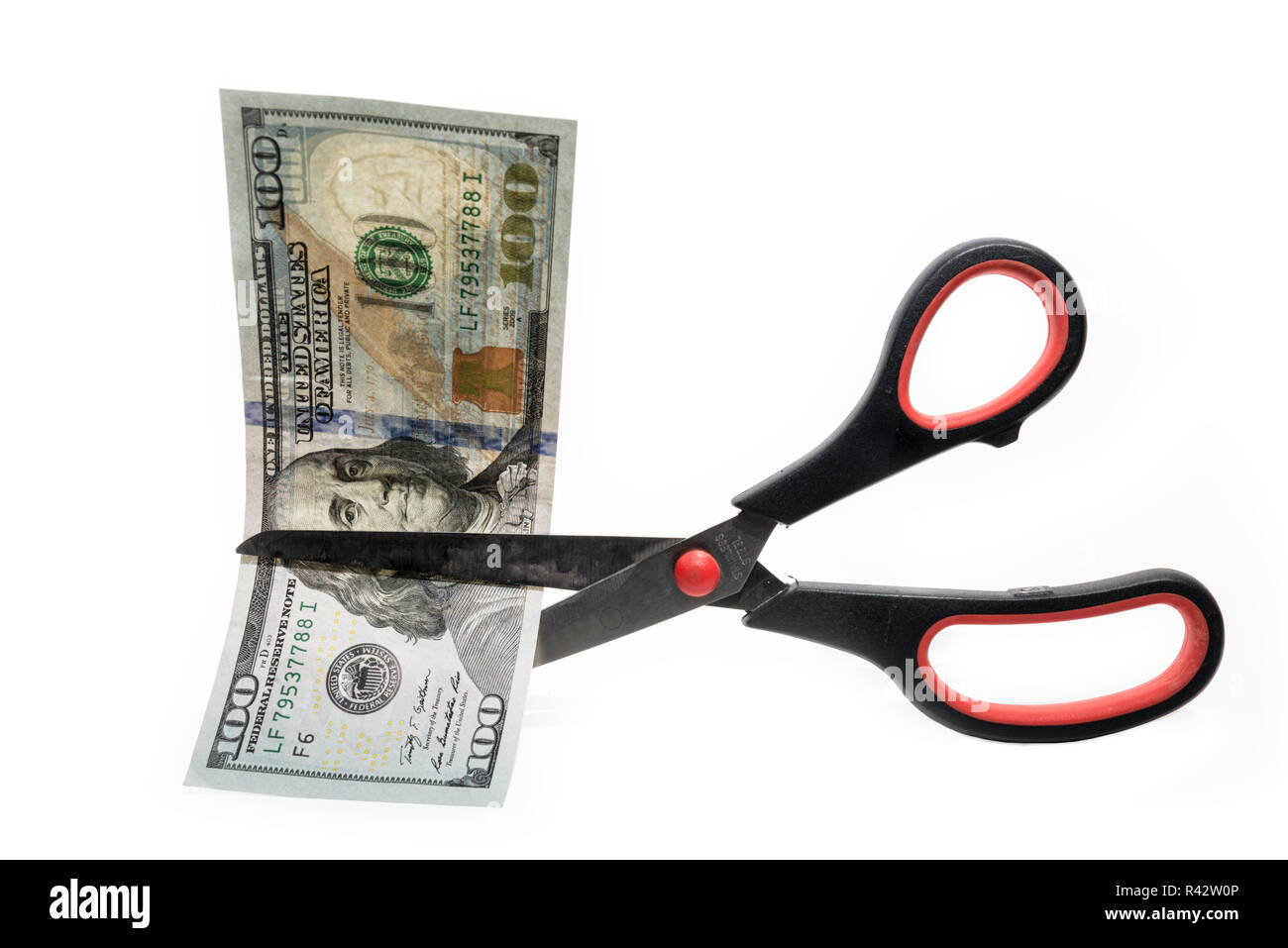 Dollars scissors money cutting hi-res stock photography and images - Alamy