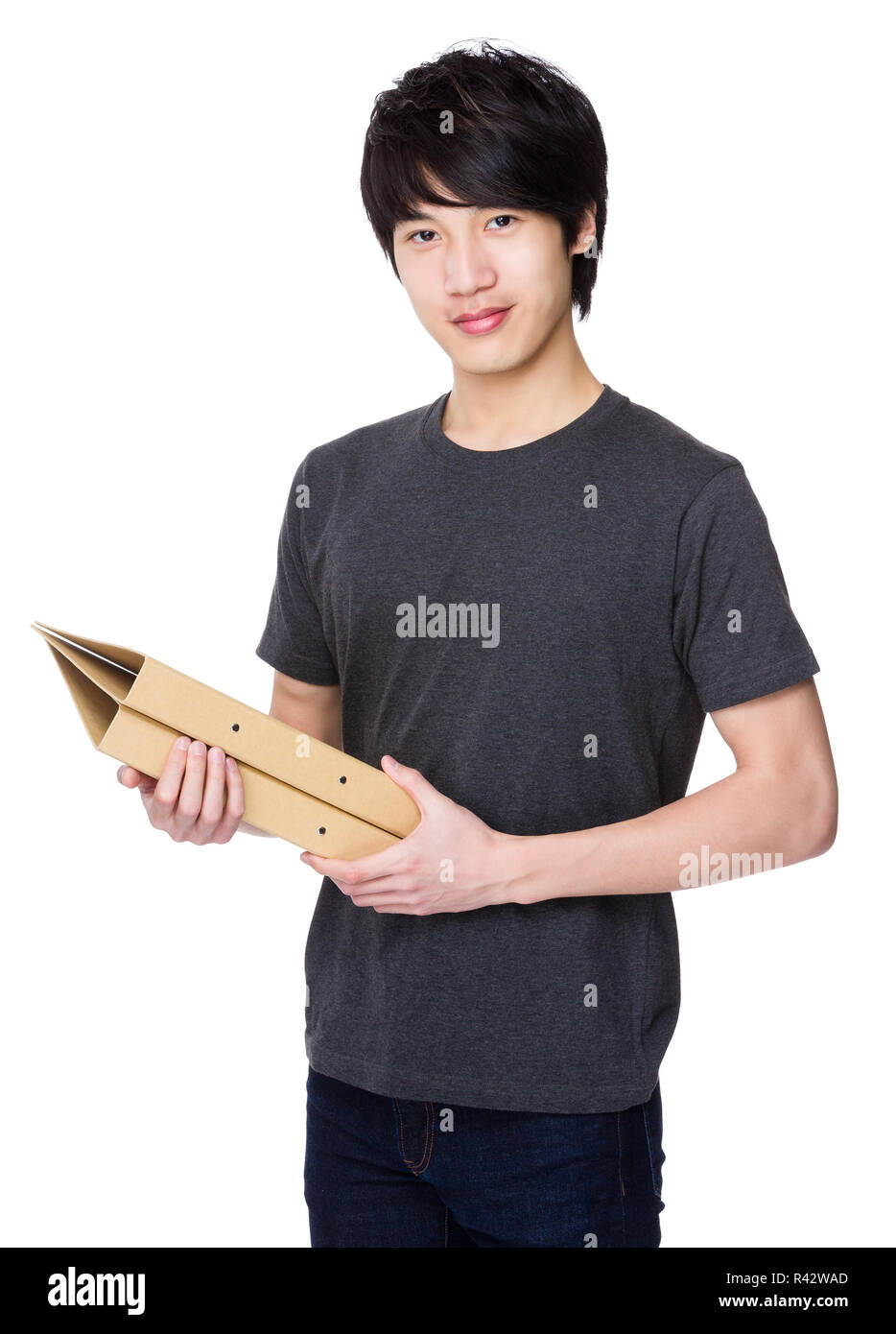 Asian Young Man hold with folder Stock Photo - Alamy