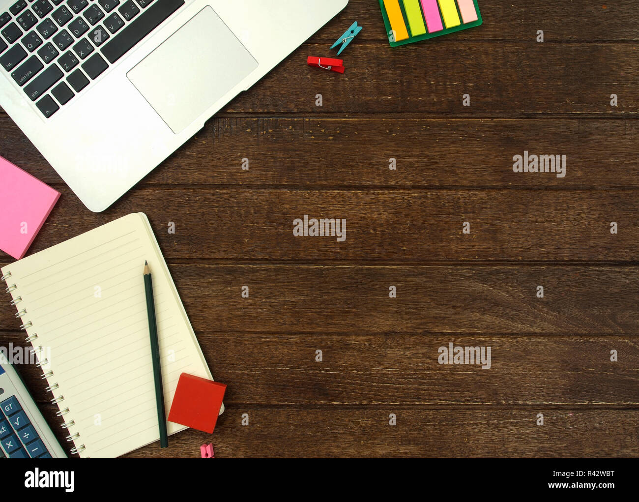 work table with computer and notebook. View from above Stock Photo - Alamy