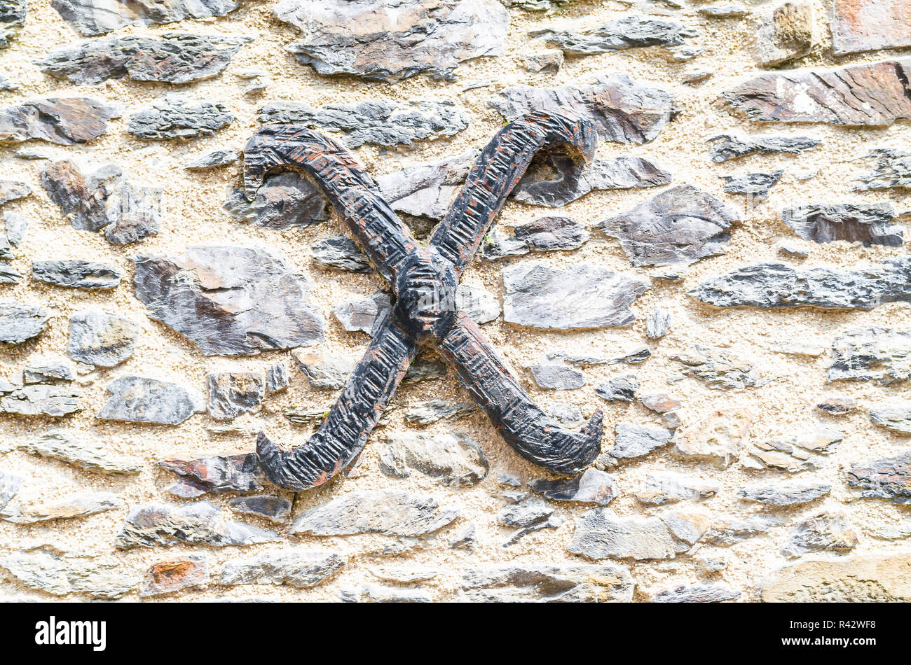 stone wall with the letter x Stock Photo - Alamy