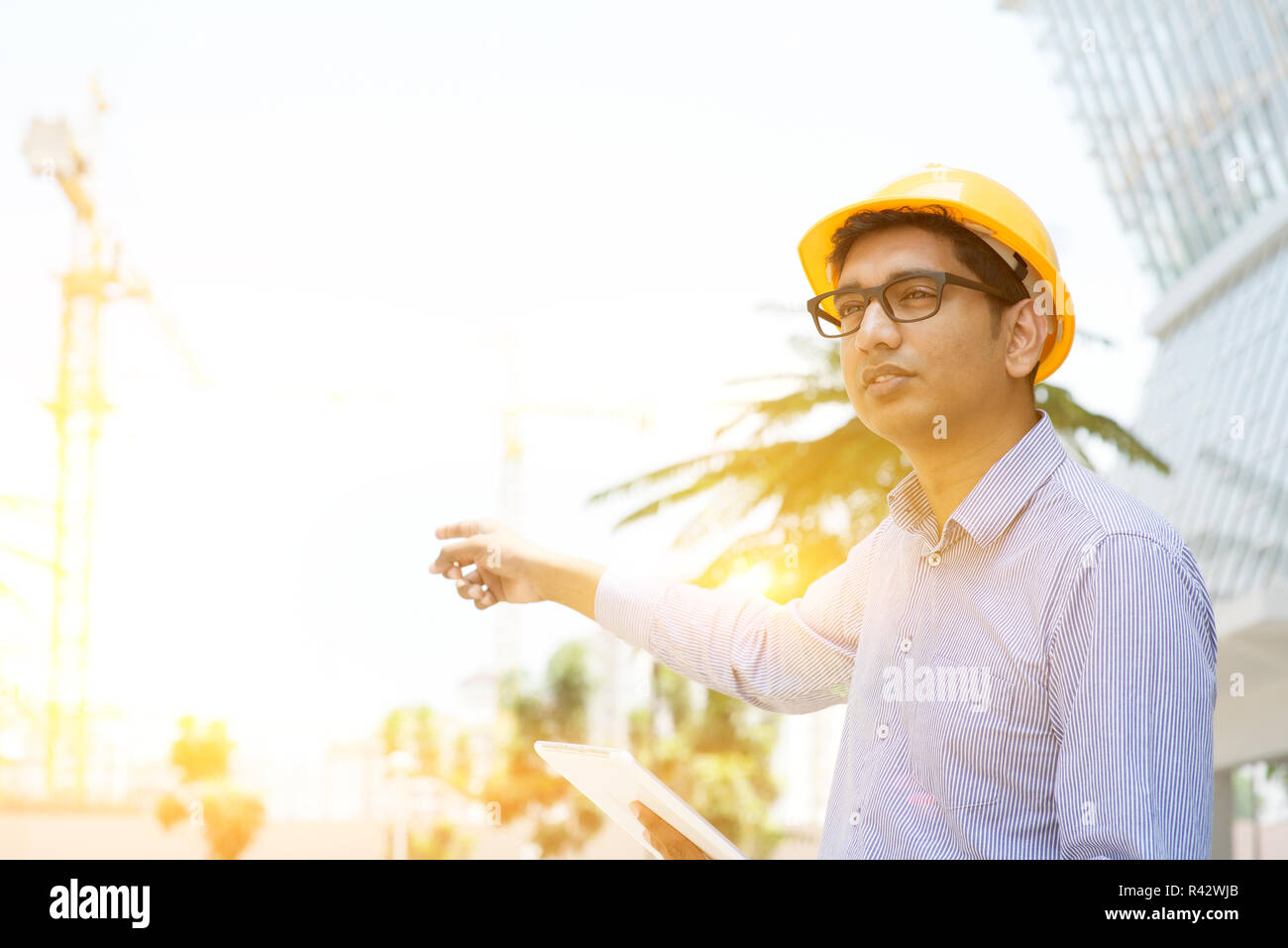 Indian male engineer inspecting site hi-res stock photography and ...