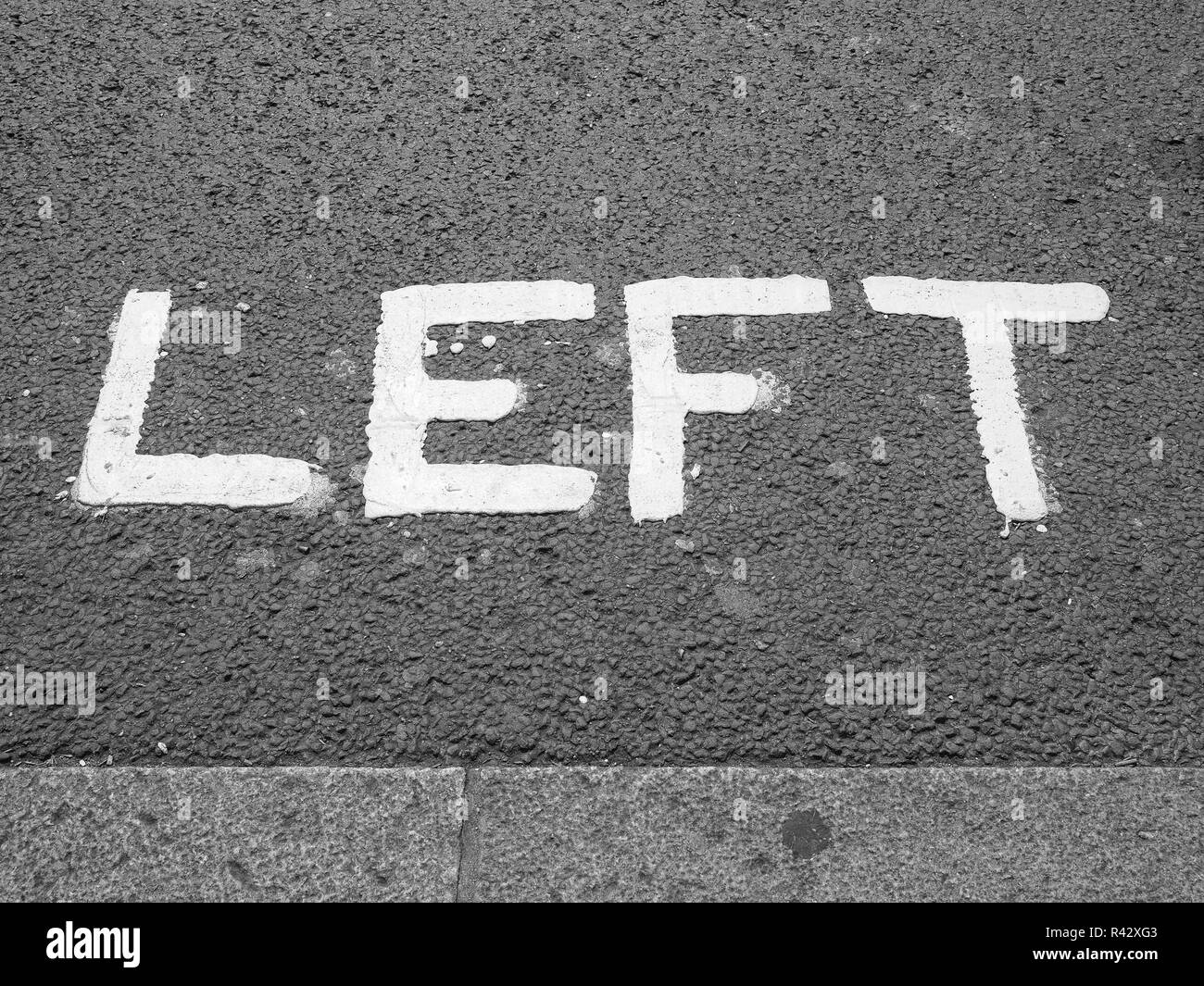 Black and white Look Left sign Stock Photo - Alamy