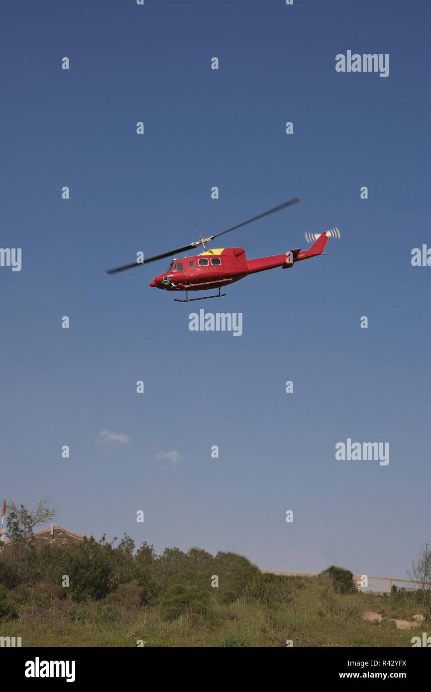 Fire brigade helicopter taking off Stock Photo - Alamy