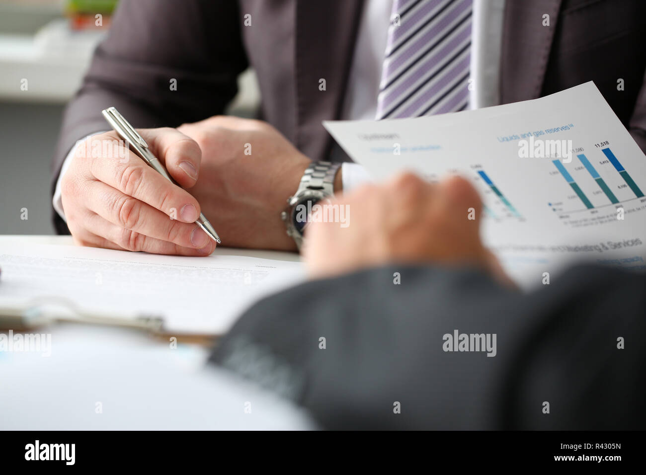 Male arm in suit and tie fill form clipped Stock Photo - Alamy