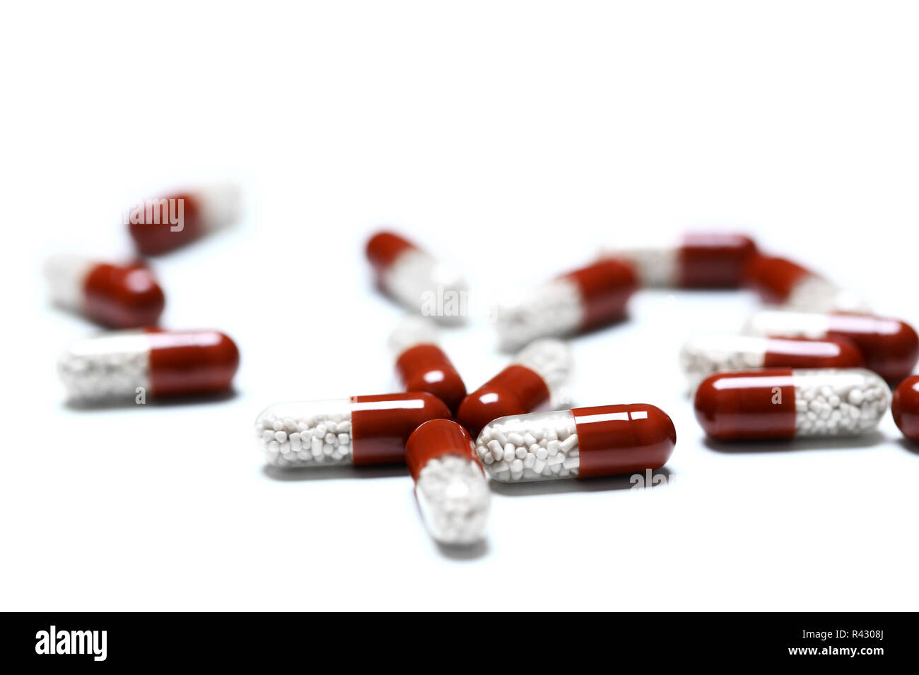 Tablets scattered on the table of the Stock Photo - Alamy