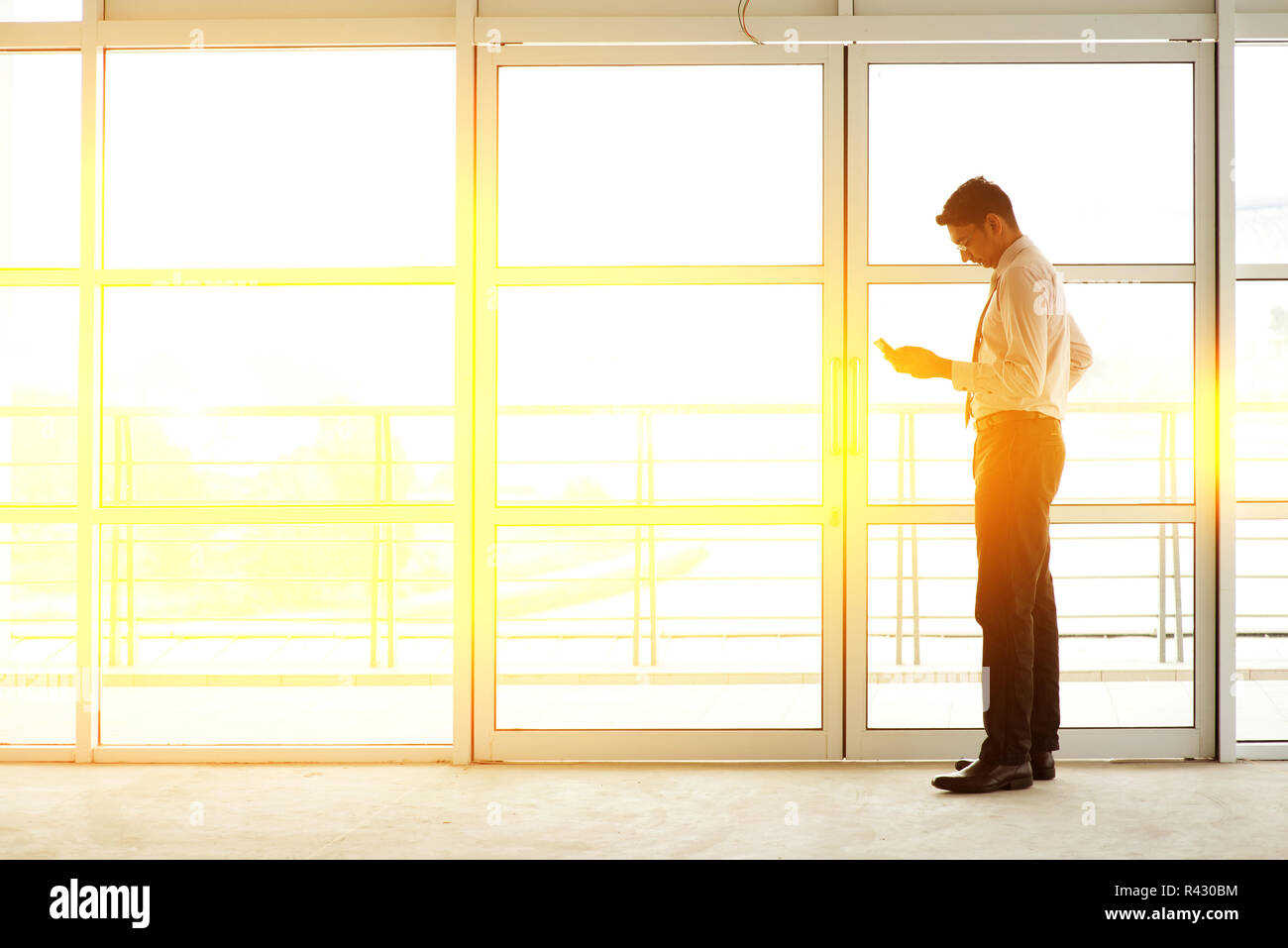 Office people using smartphone Stock Photo - Alamy