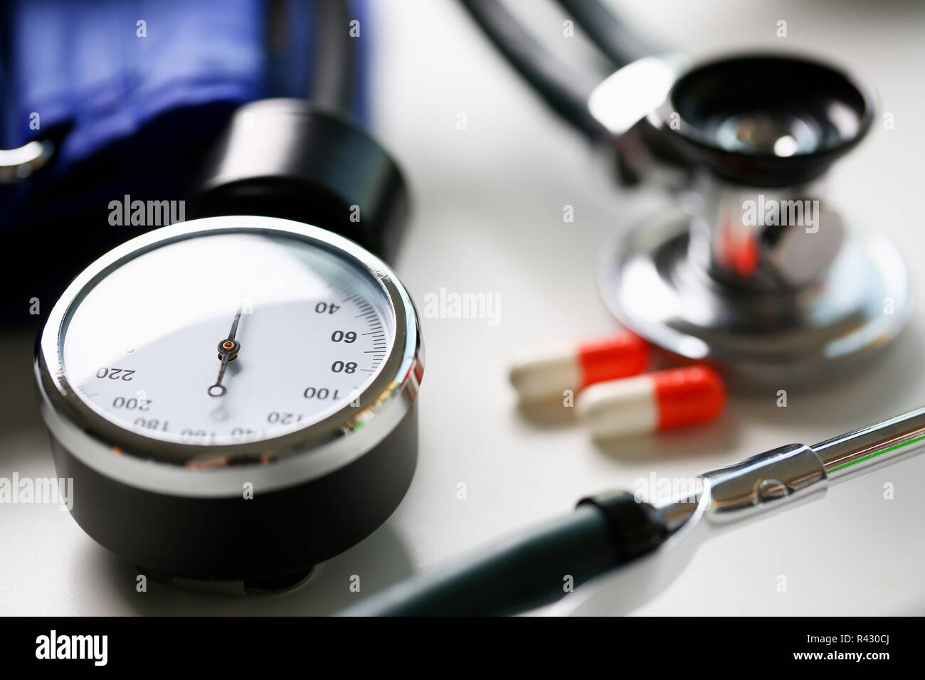 Device for measuring blood pressure in doctor Stock Photo - Alamy