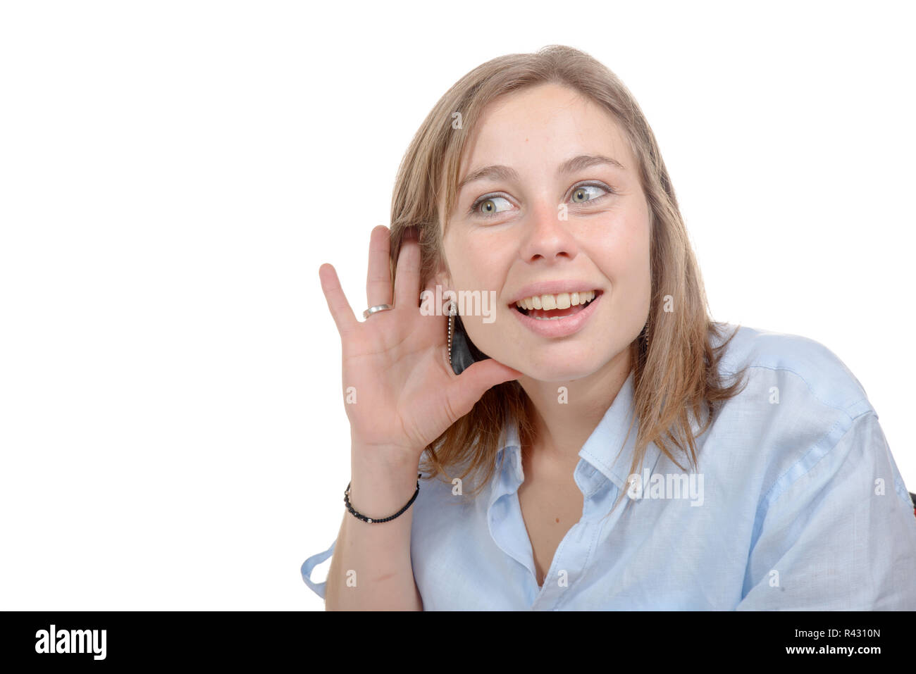 woman listening with hand to ear concept Stock Photo - Alamy