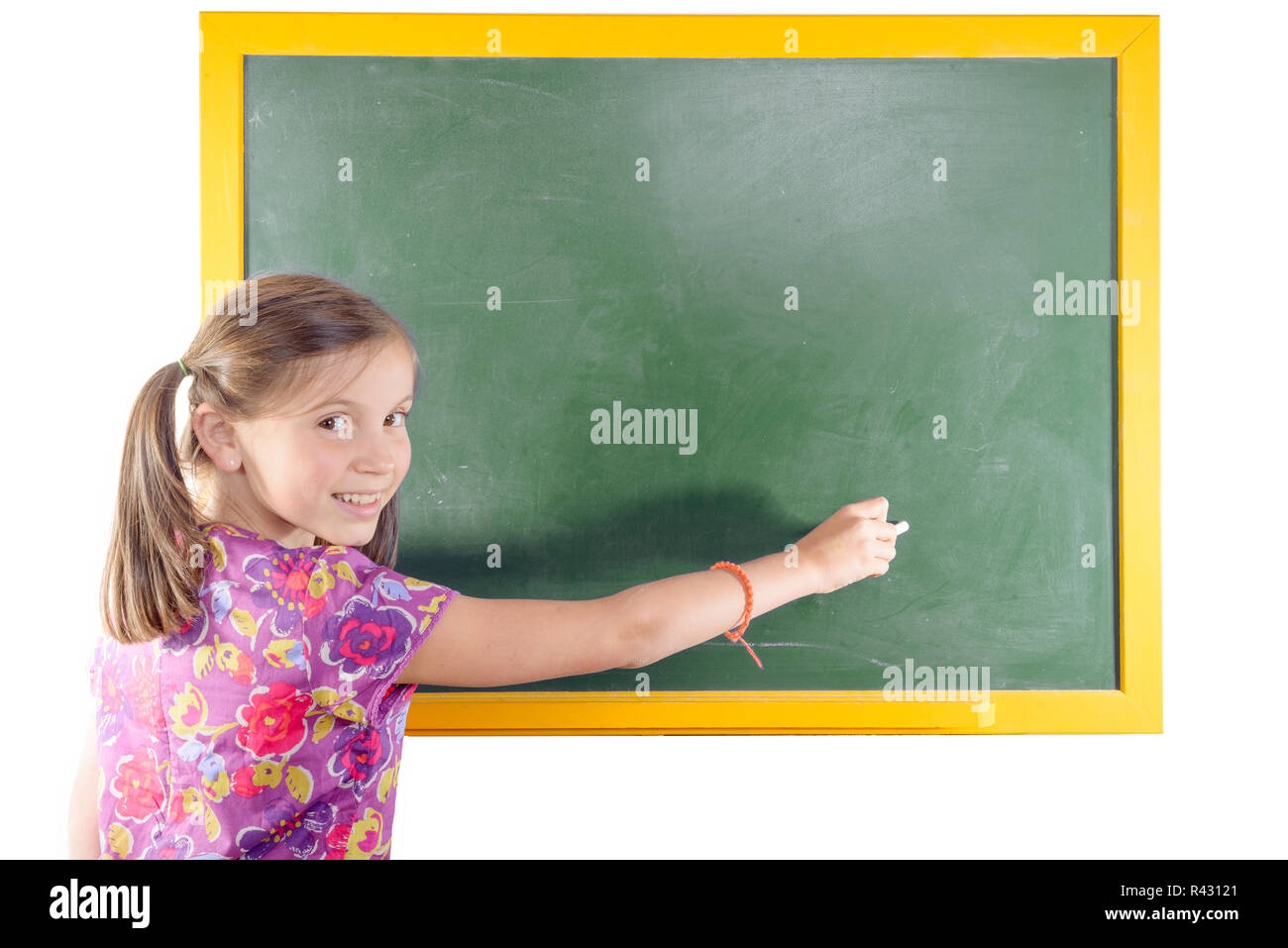 Child writes on a blackboard hi-res stock photography and images - Alamy