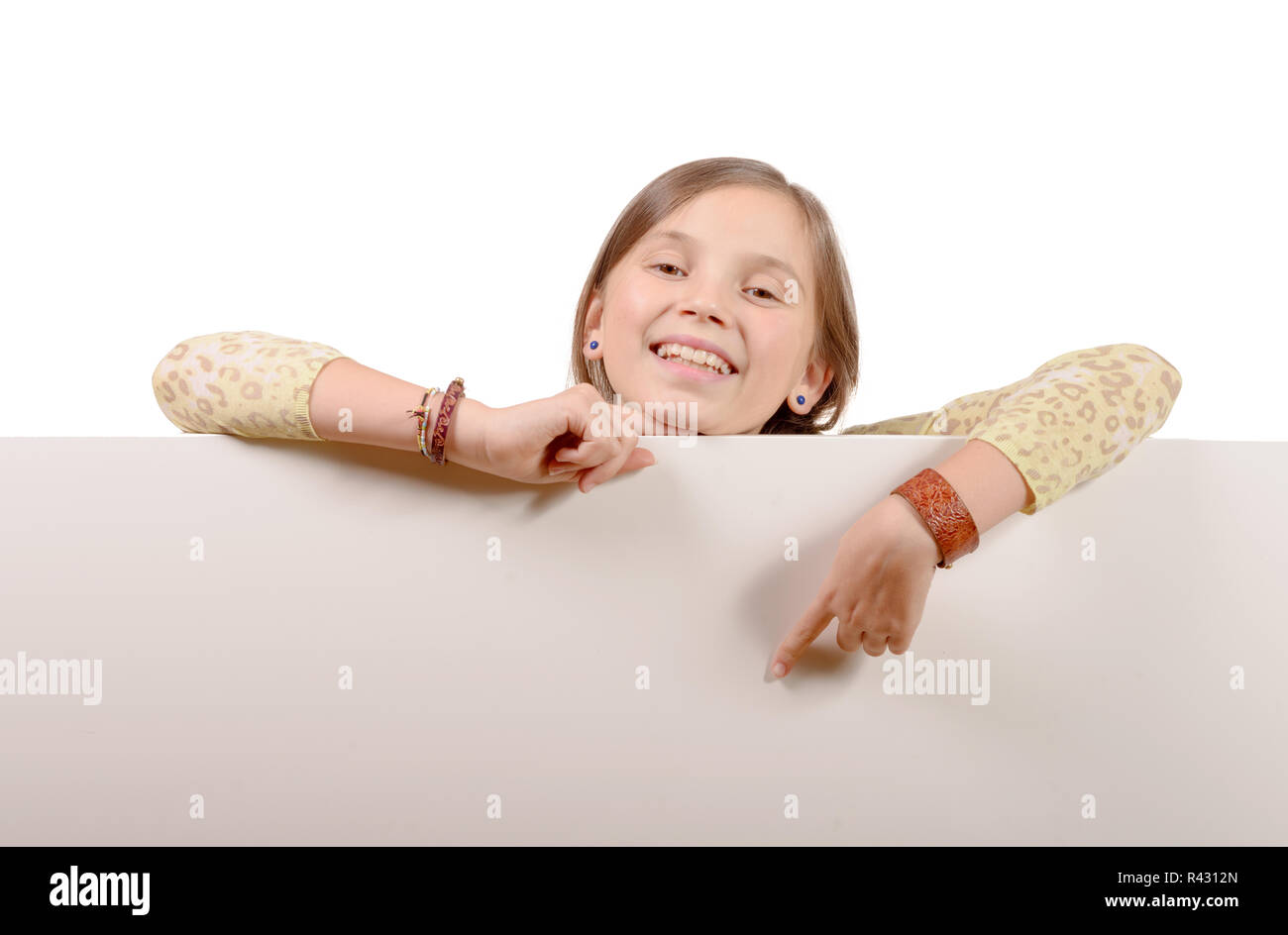 Beautiful young girl with a blank poster isolated Stock Photo - Alamy