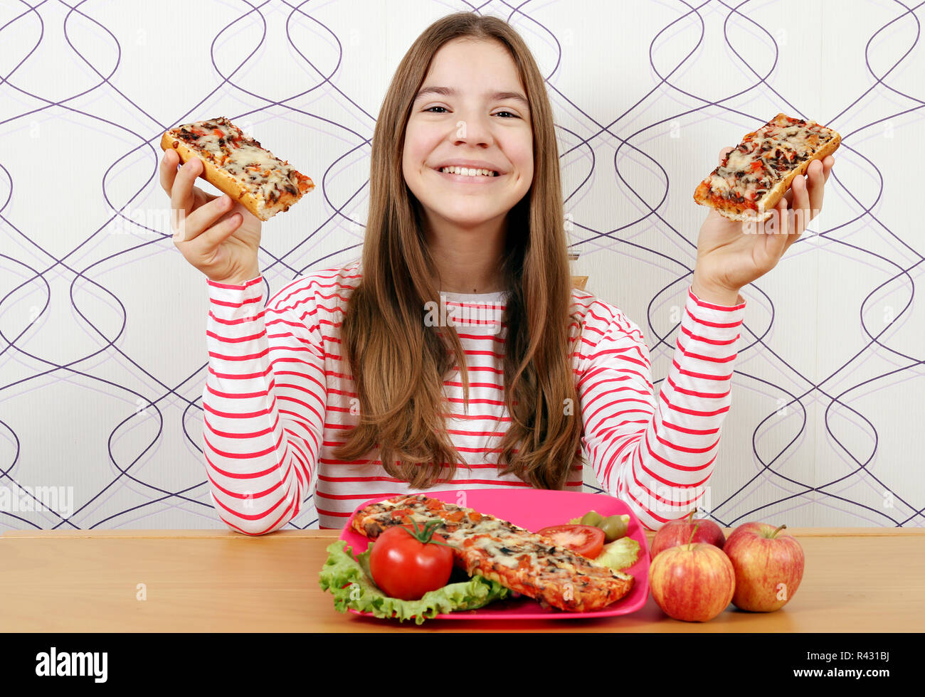 Happy beautiful teenage girl with sandwiches Stock Photo - Alamy
