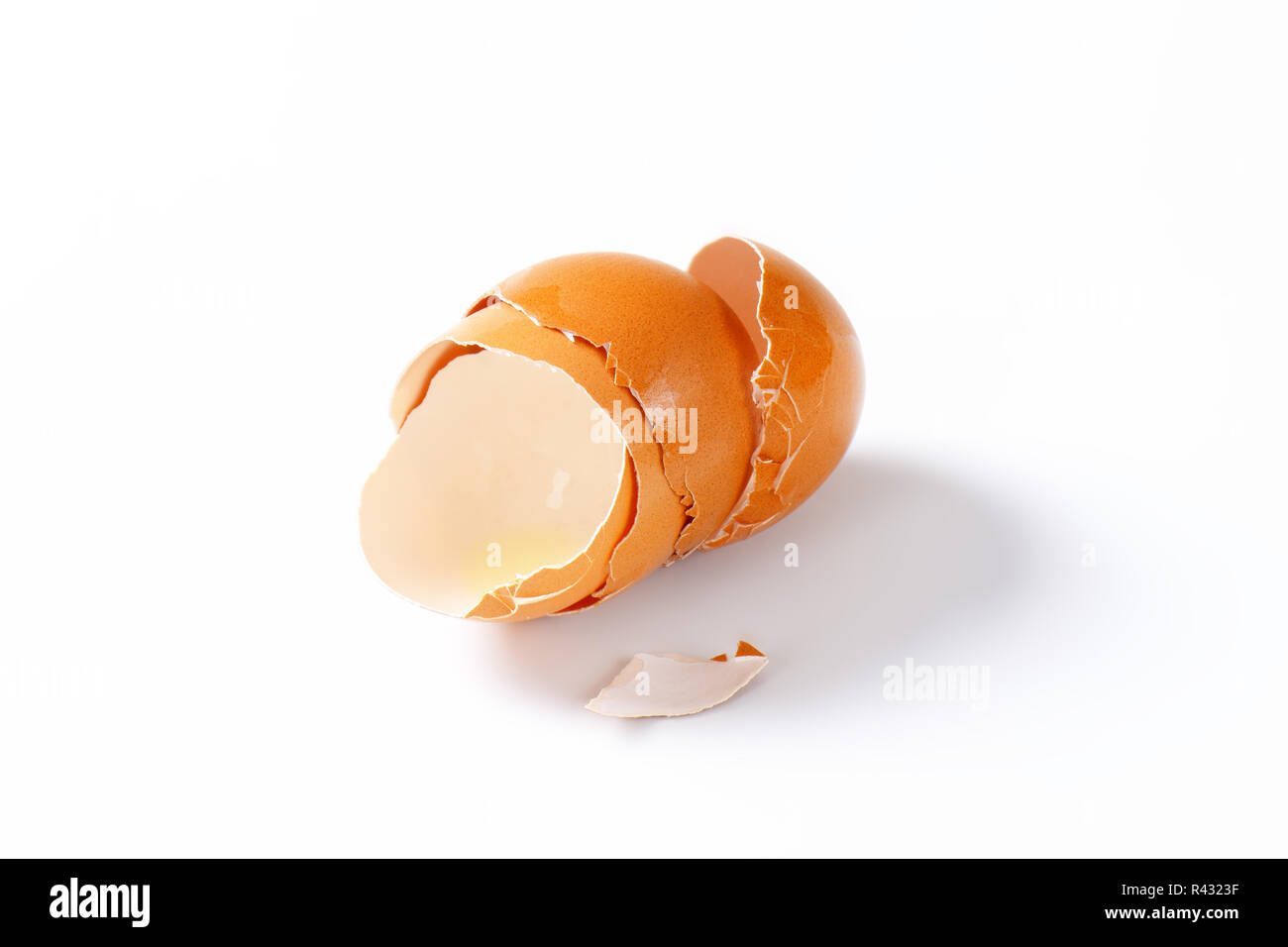 Empty broken brown egg Cut Out Stock Images & Pictures - Alamy
