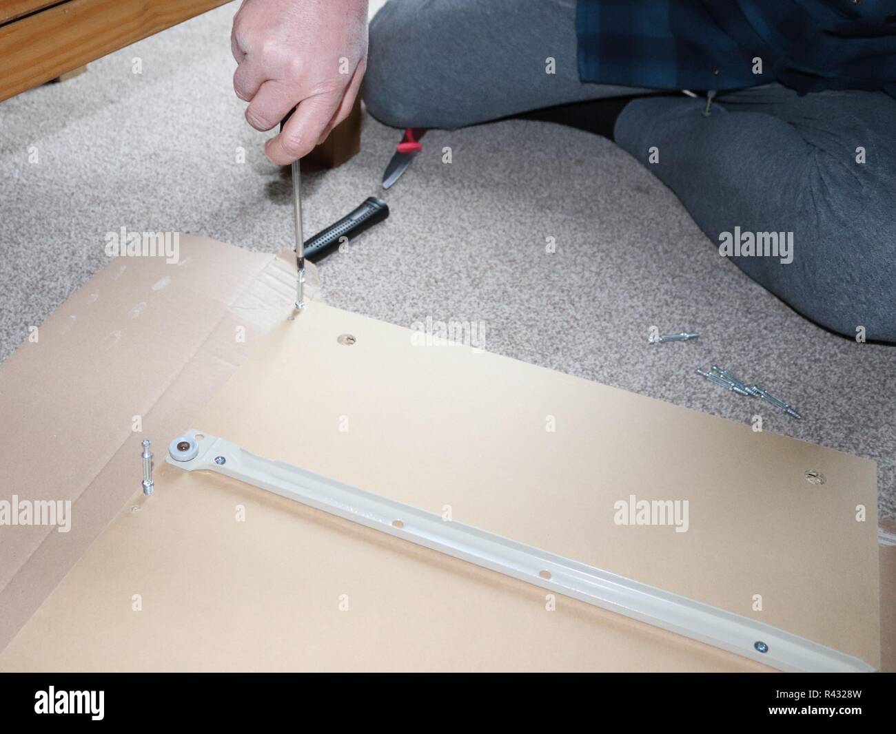 Diy Flat Pack Furniture Project In The Home Hammer Screw And Fix Stock