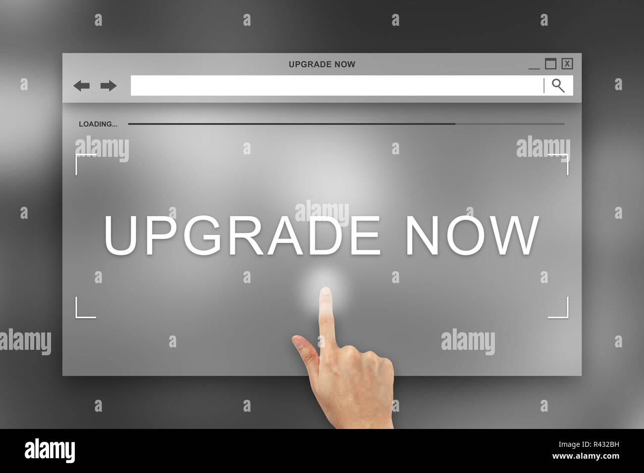 hand press on upgrade now button on website Stock Photo - Alamy