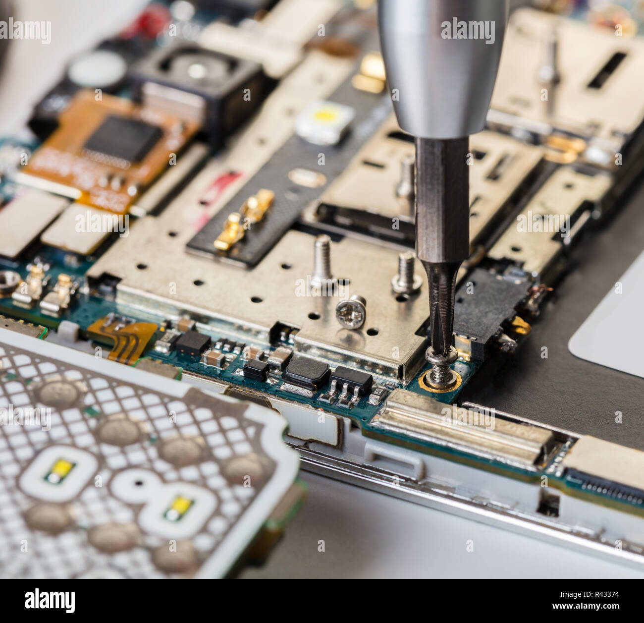 Mobile screwdriver hi-res stock photography and images - Alamy