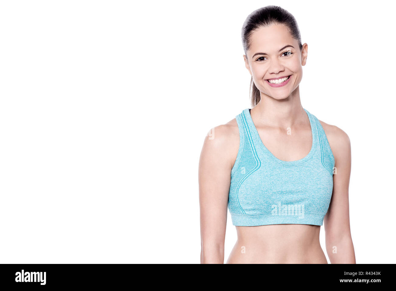 Smiling slim woman in sportswear Stock Photo - Alamy