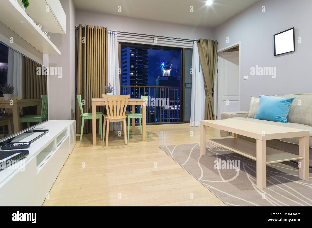 Luxury Interior living room with blue sky at twilight time Stock Photo ...