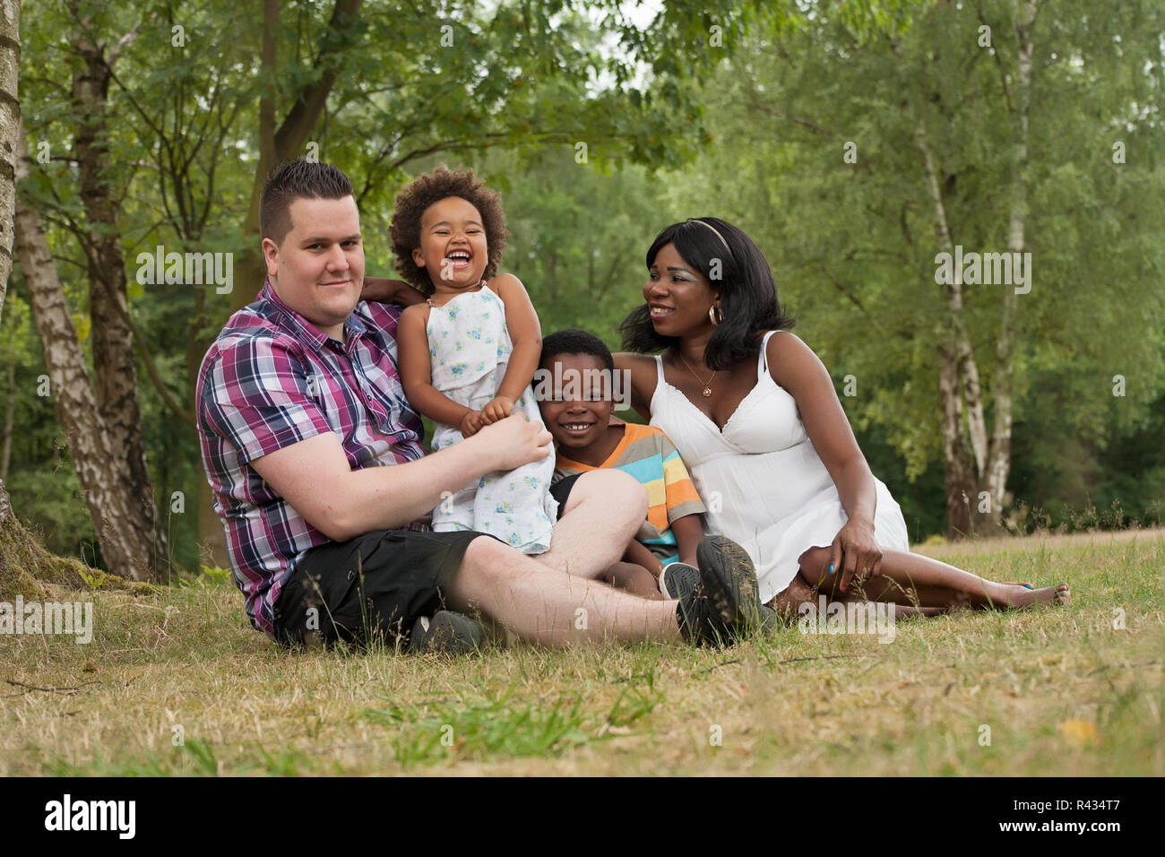 Portrait of a multicultural family Stock Photo - Alamy