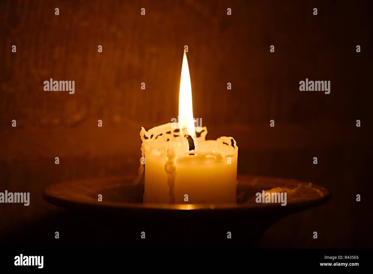 Candle flames burn on table hi-res stock photography and images - Alamy