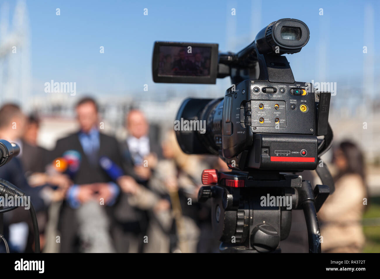 News conference. Filming an event with a video camera Stock Photo - Alamy